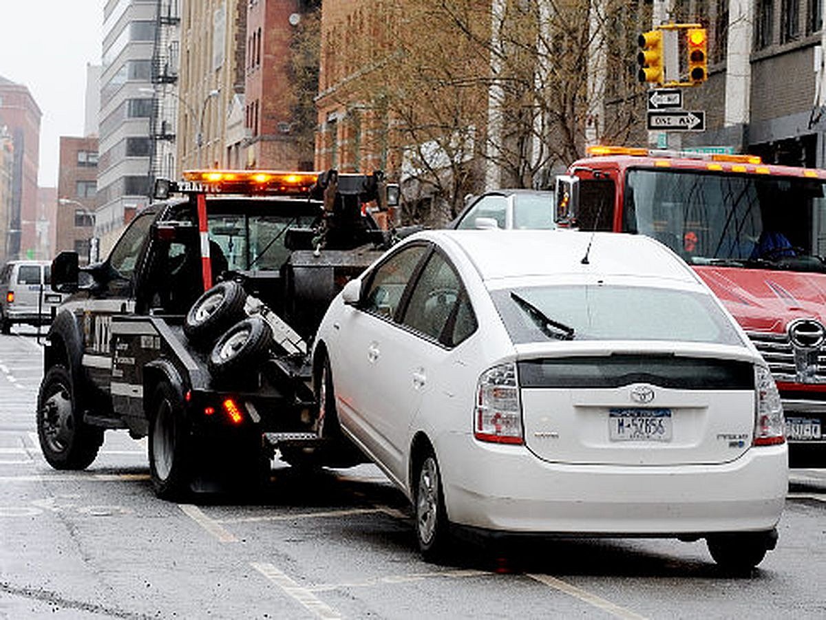 Car Towed Away With Boy In It car-towed-away-with-boy-in-it