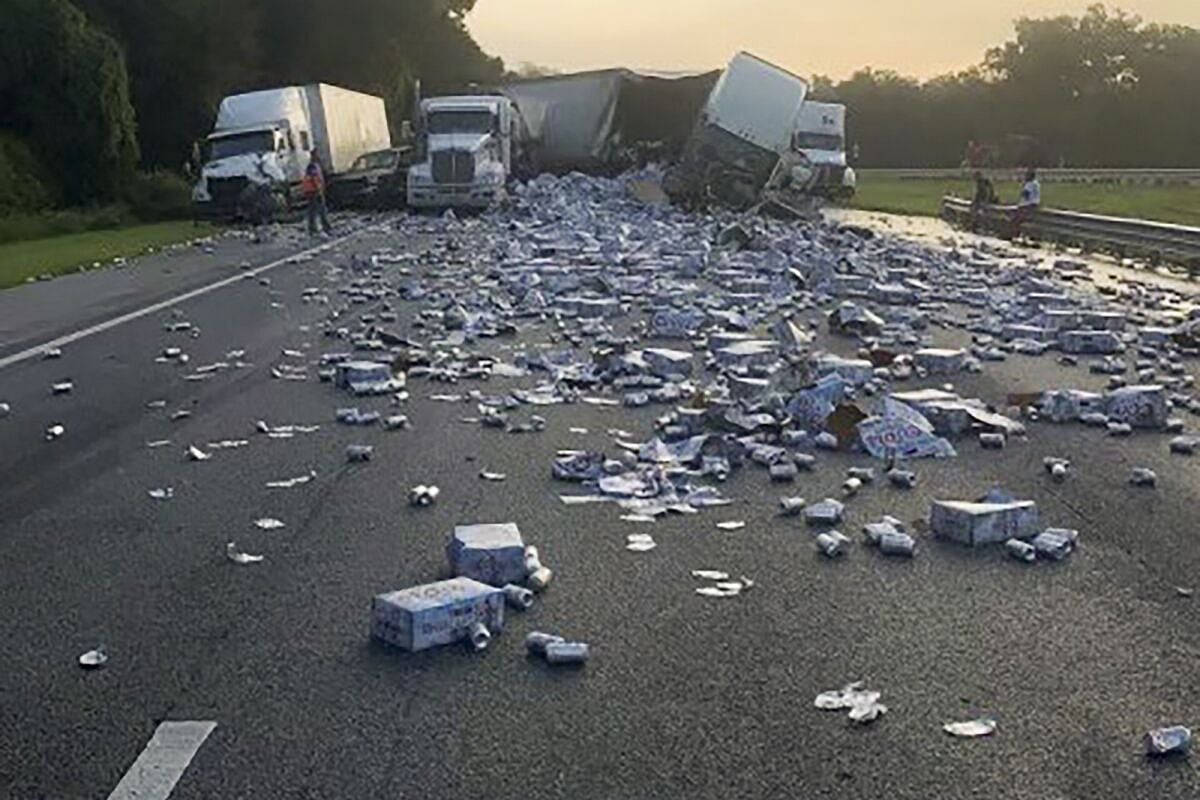 Florida highway blocked after truck carrying thousands of beer cans crashes