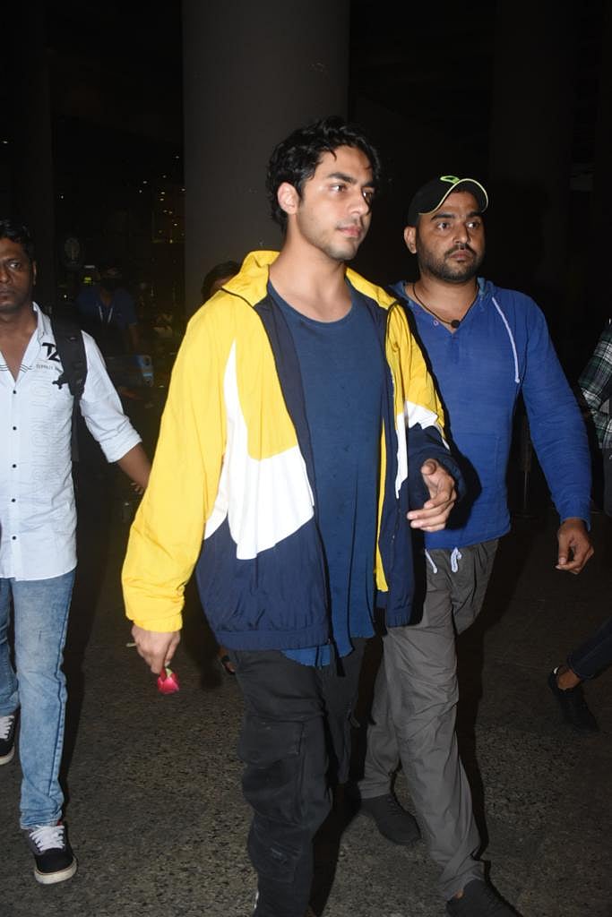 Photos: Aryan Khan receives rose from fan at Mumbai airport