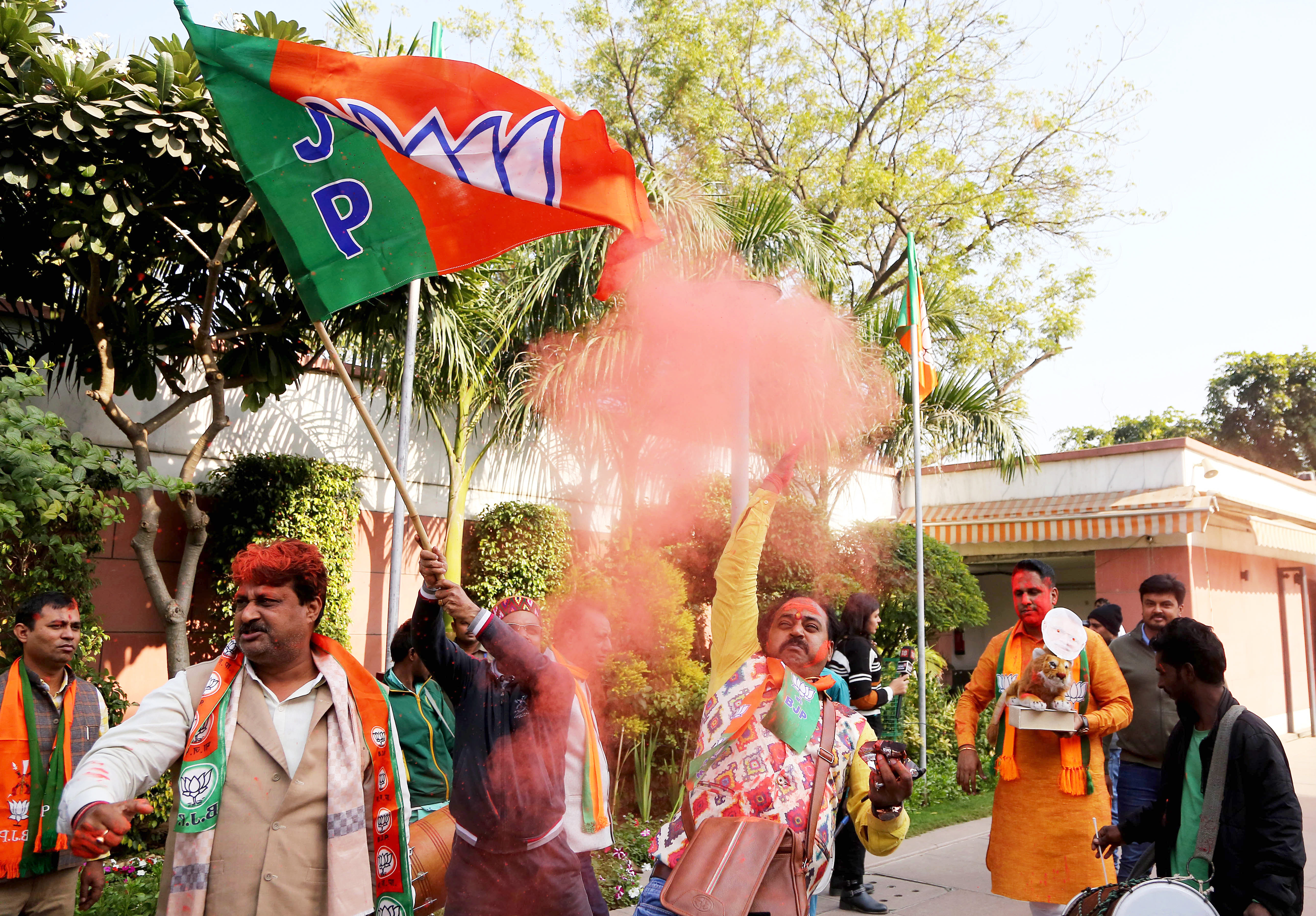 IN PICS: Celebration begins as BJP heads for historic win in Gujarat