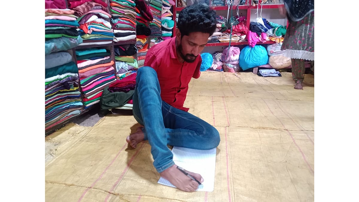 WATCH: Born Without Hands, MP Man Trains Self To Write With Foot