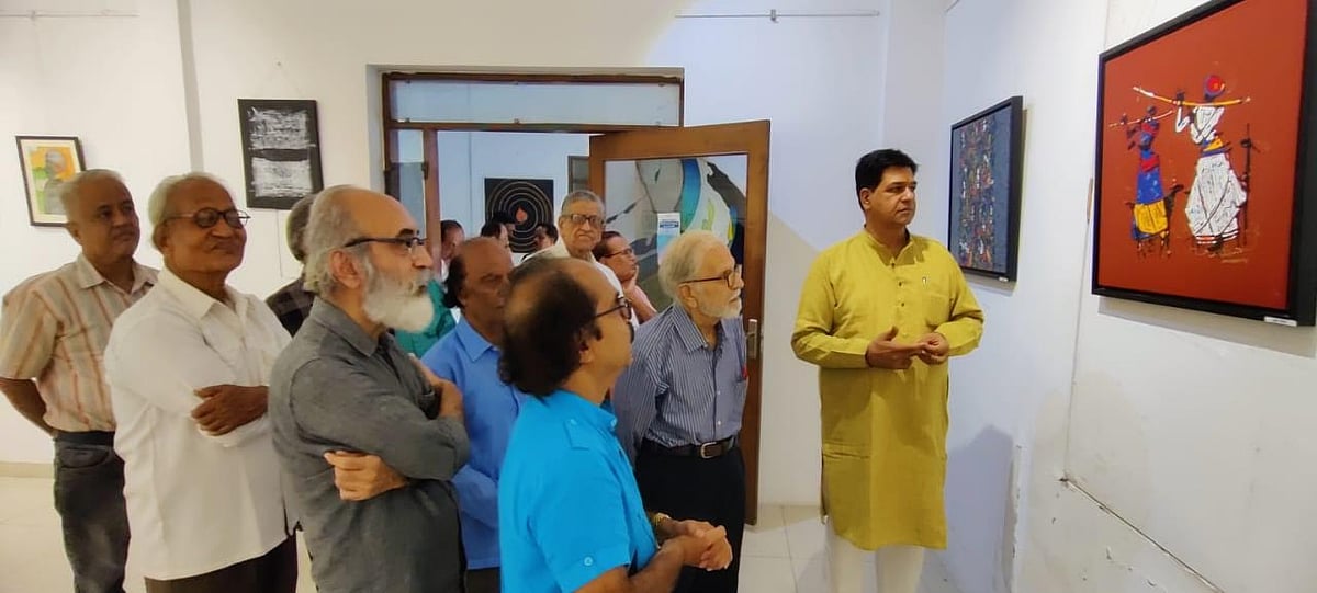 41st Shalaka Exhibition Begins: Tribal's Daughter Showcases Paintings ...