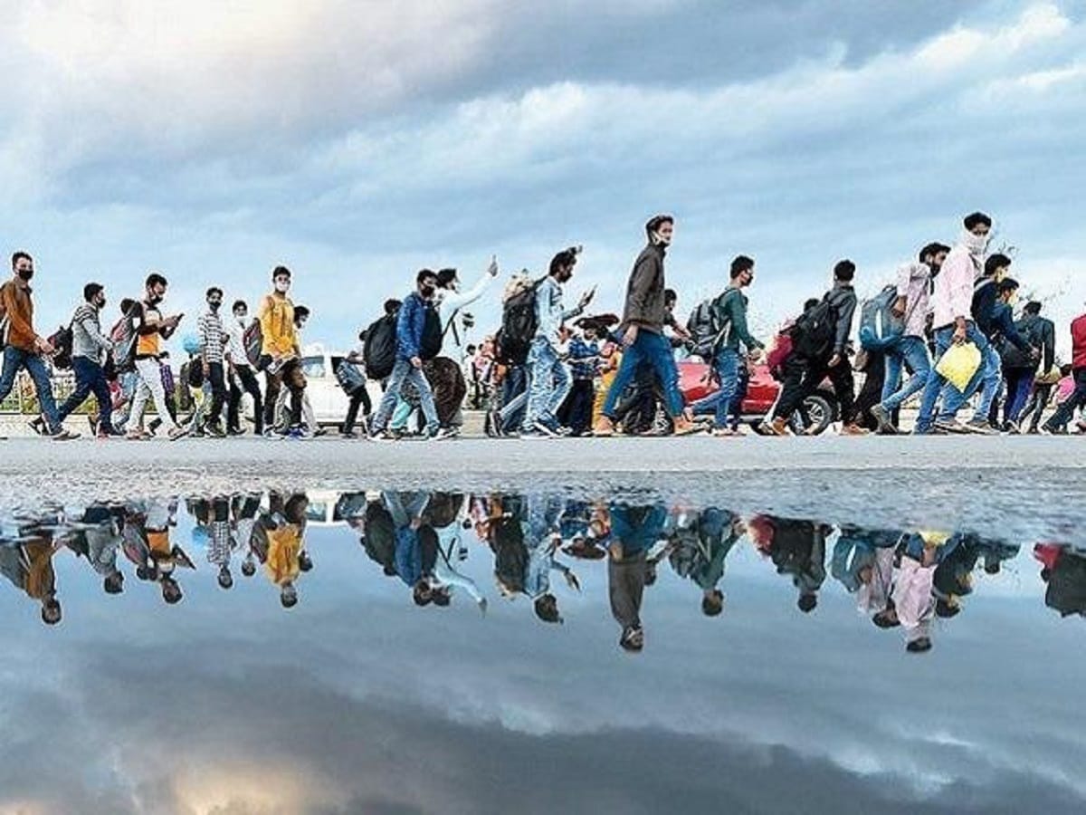 With no govt help forthcoming, migrants with blisters on their feet ...
