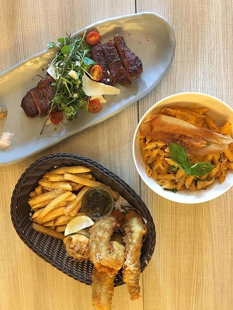 Alama: Fat Cow in a booming city