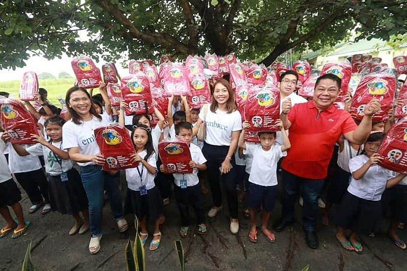 NGO, Rotary clubs bring smile to Bacolor pupils