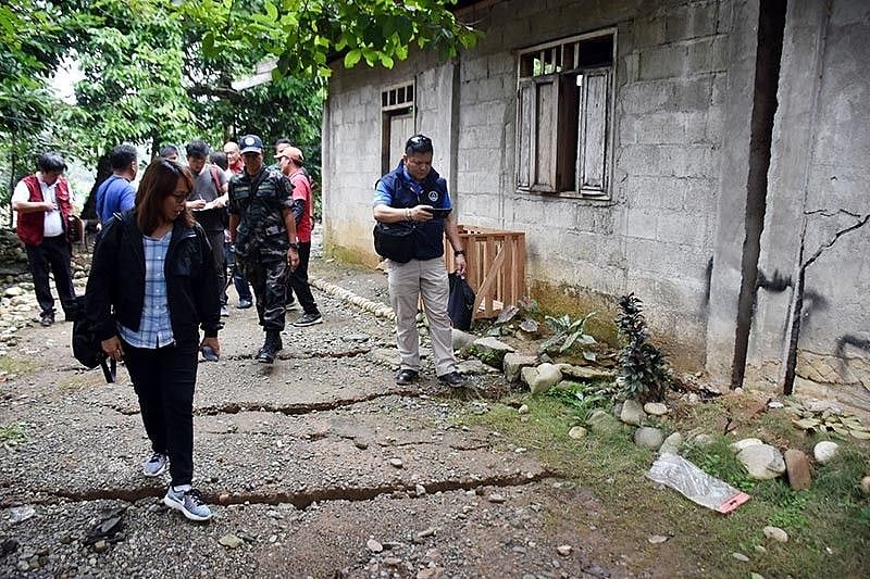 Inspection of tension cracks in Apayao