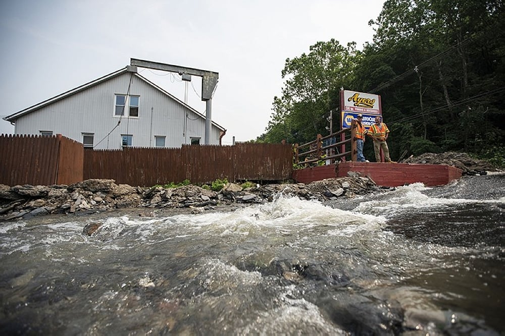 Children lost in flooding as US endures extreme weather, from smoke up ...
