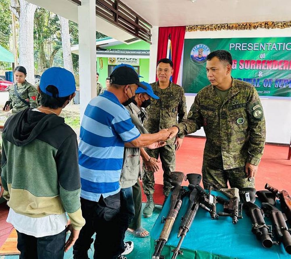 Death of ASG leader leads to surrender of 14 followers