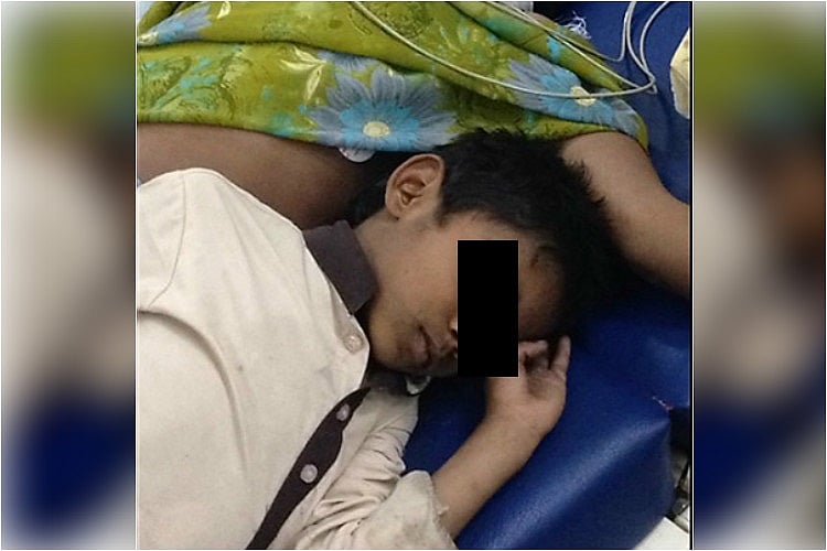 After moving pic of Hyd boy sleeping next to dead mother goes viral ...