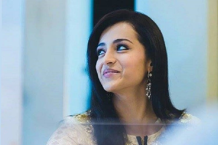 Trisha on a roll, wraps three films at a time