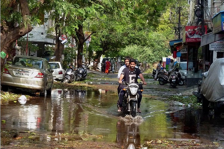 Hyderabad witnesses heavy rain with hail, trees uprooted and property ...