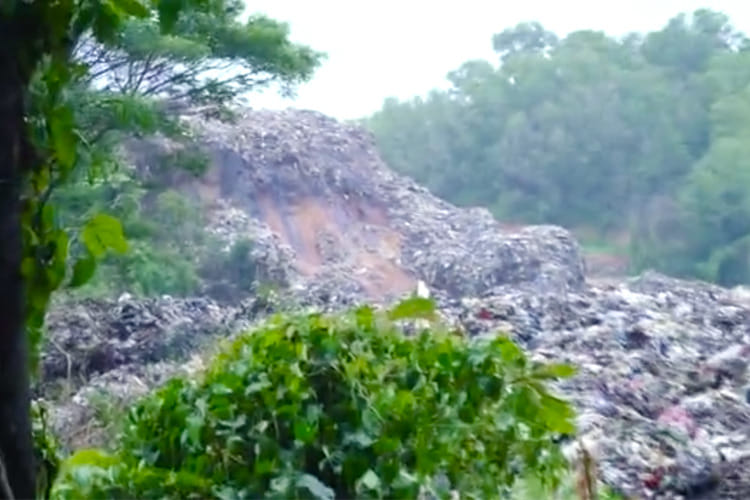 Waste from landfill slides down with rainwater in Mangaluru, enters ...