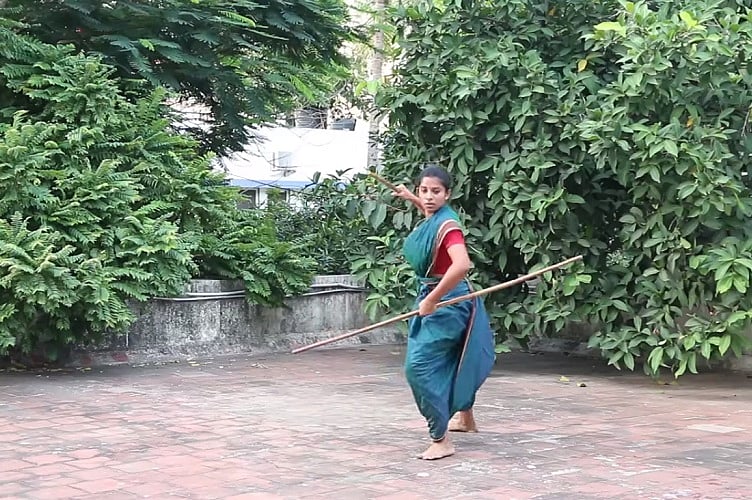 Acing silambam in a saree: This Chennai woman combines beauty and ...